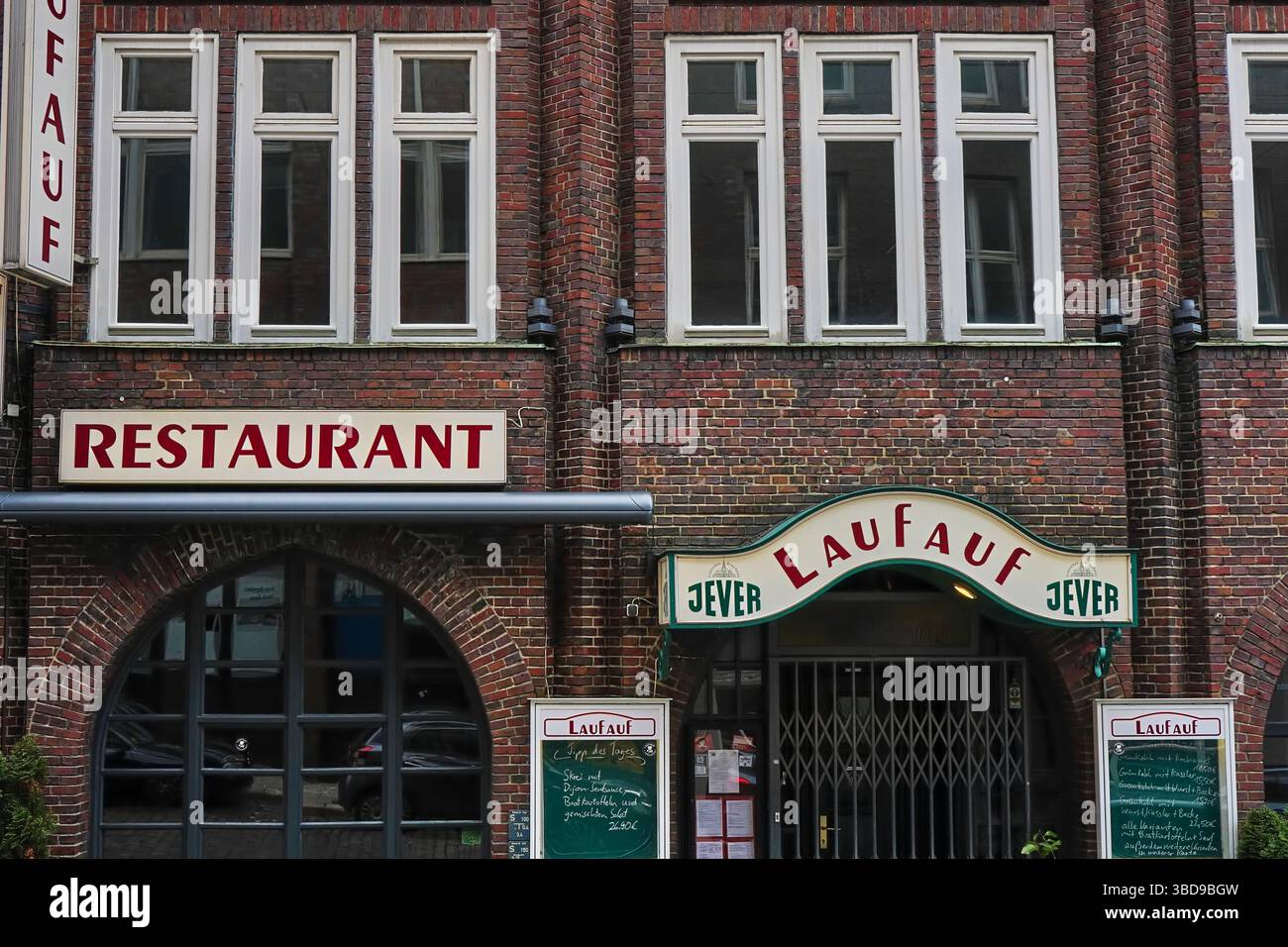 Historic brick building housing Restaurant Laufauf in Hamburg, Germany ...
