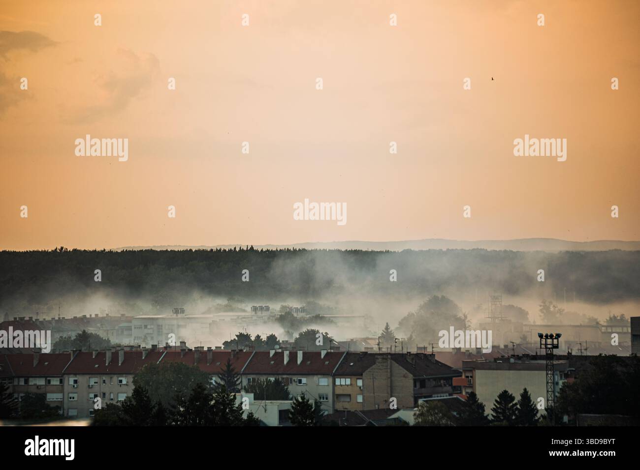 Heavy chemical fog enveloping Osijek city rooftops for mosquito ...