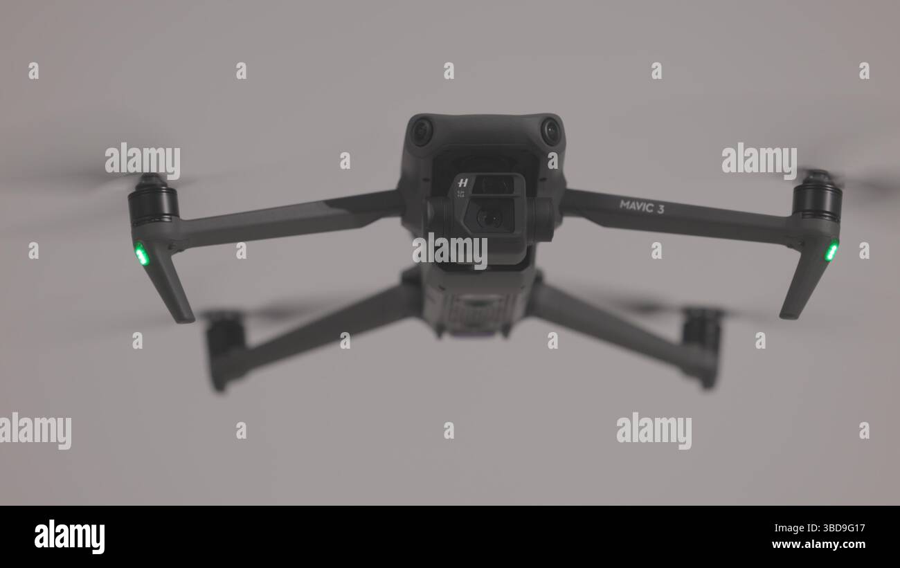 DJI Mavic 3 - Flying on white background. Most popular drones. Copter ...