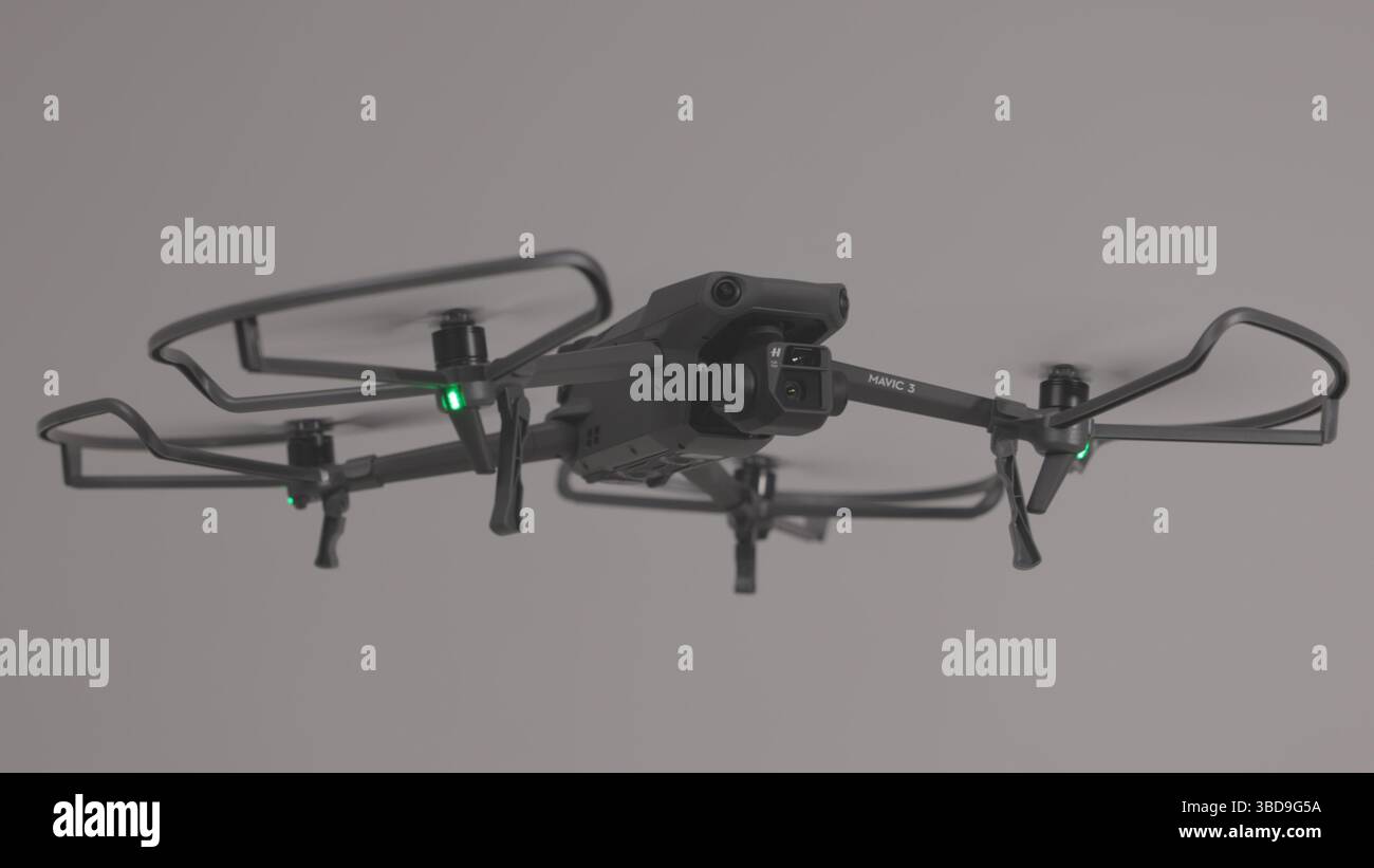 DJI Mavic 3 - Flying on white background. Most popular drones. Copter ...