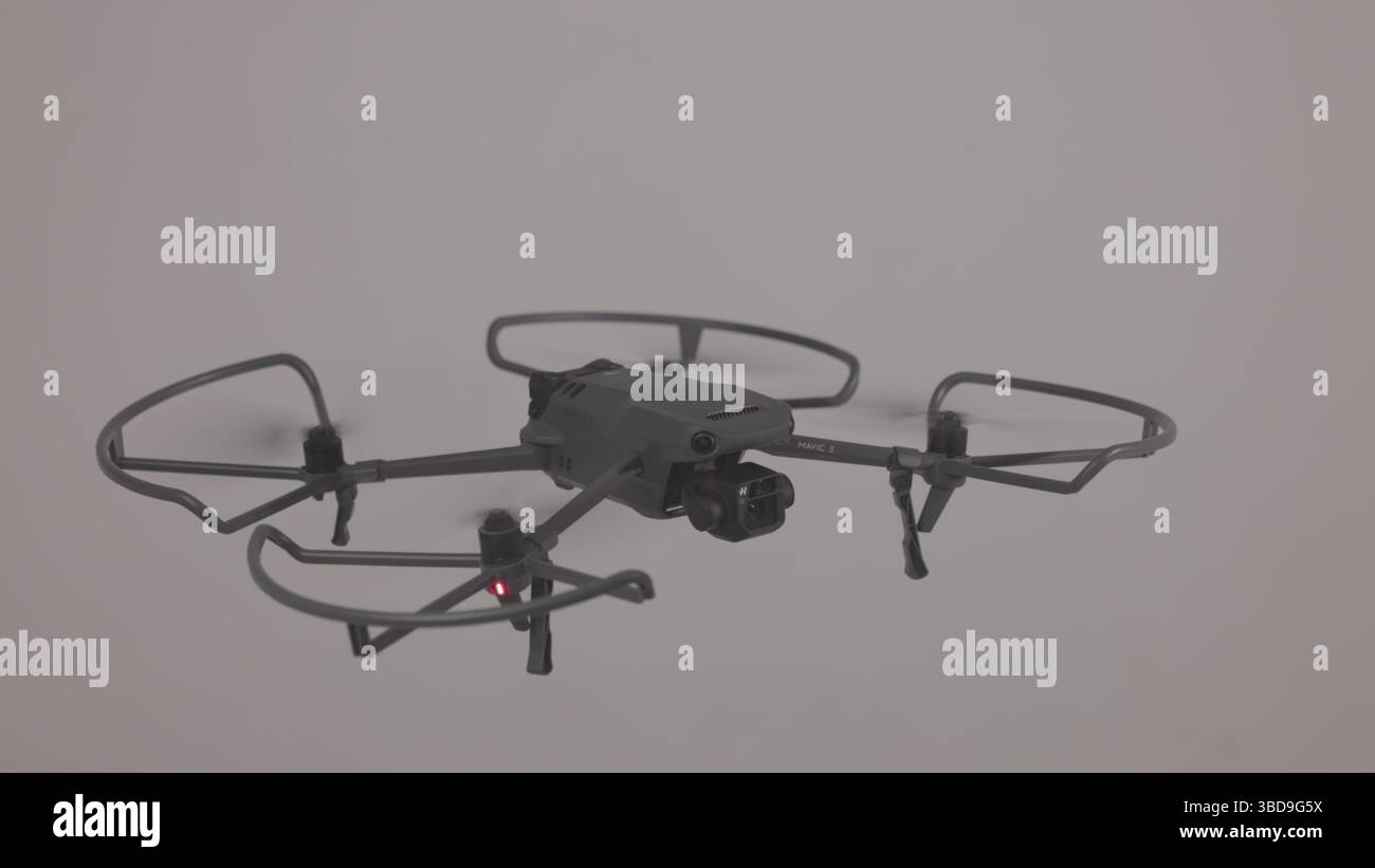 DJI Mavic 3 - Flying on white background. Most popular drones. Copter ...