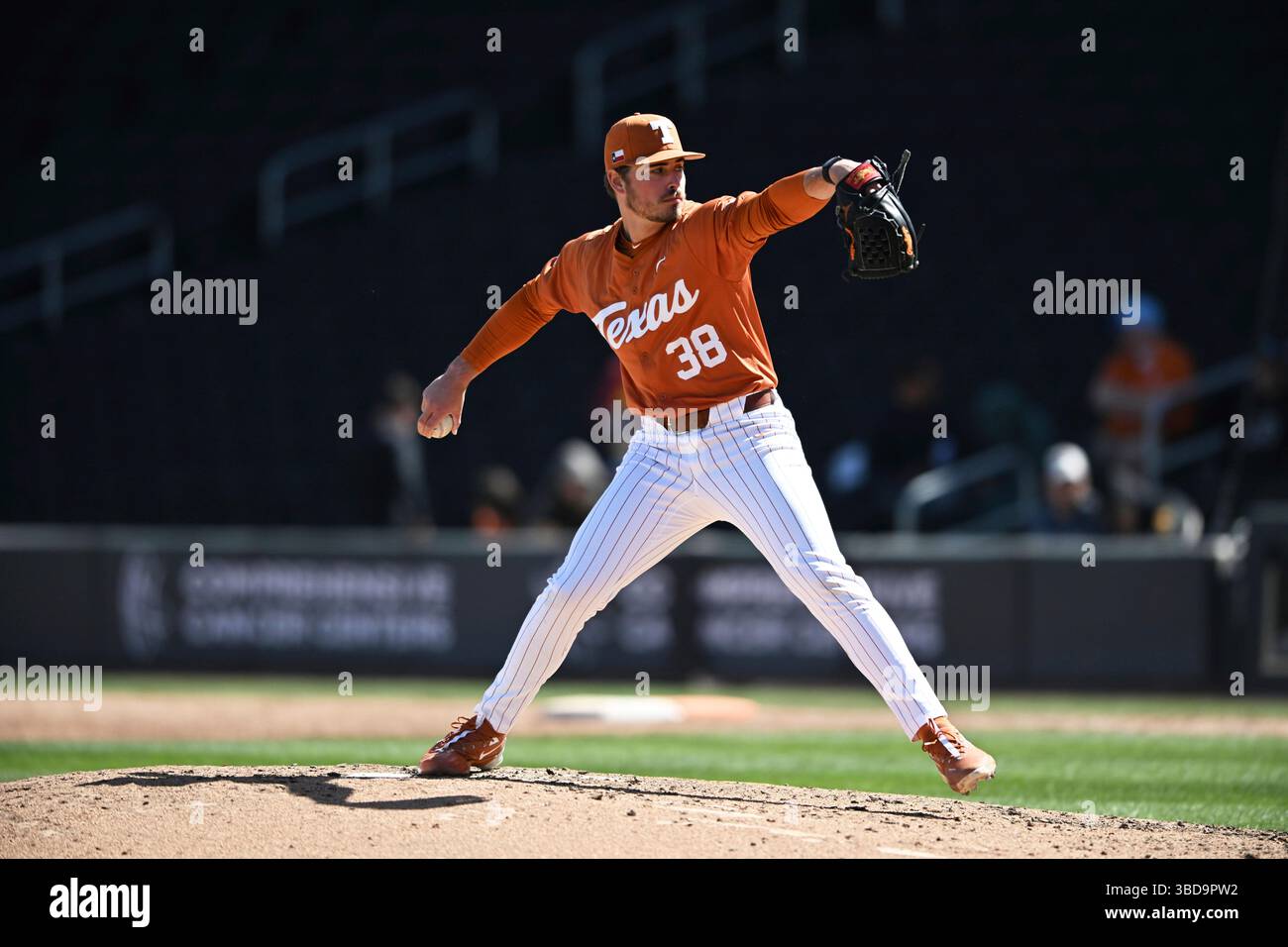 Texas Longhorns pitcher Max Grubbs (38) delivers a pitch during a game ...