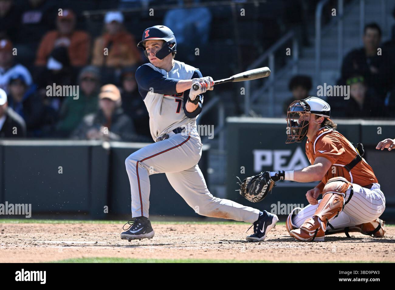Grant Ross (7) of the Illinois Fighting Illini follows through on a swing during a game against ...