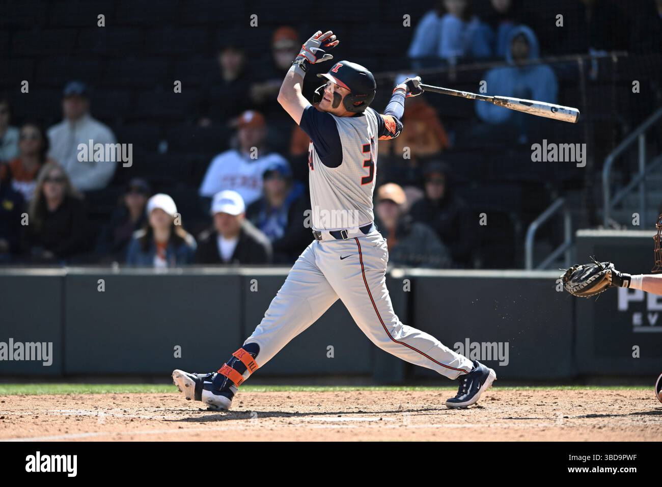 Drake Westcott (34) of the Illinois Fighting Illini follows through on ...