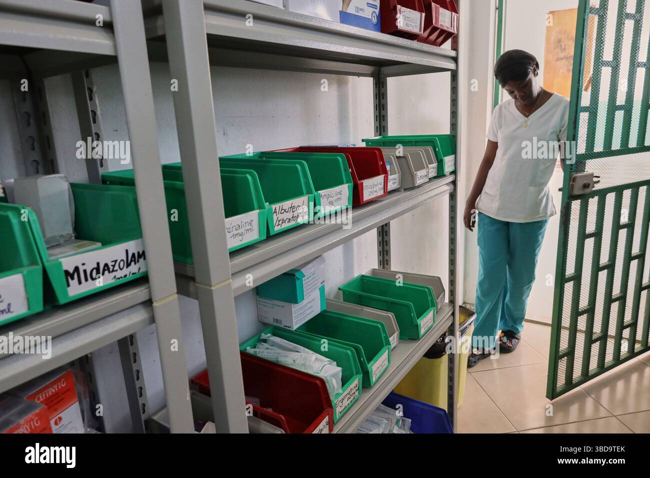 A nurse enters the medicine inventory room at New Hope Hospital in ...