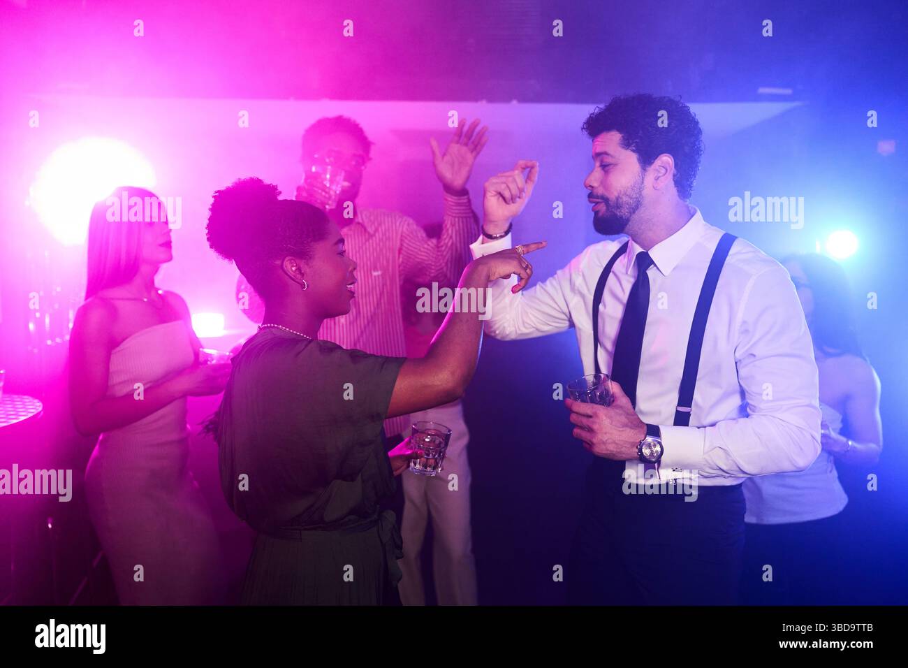 Diverse group of friends dancing at nightclub party Stock Photo - Alamy