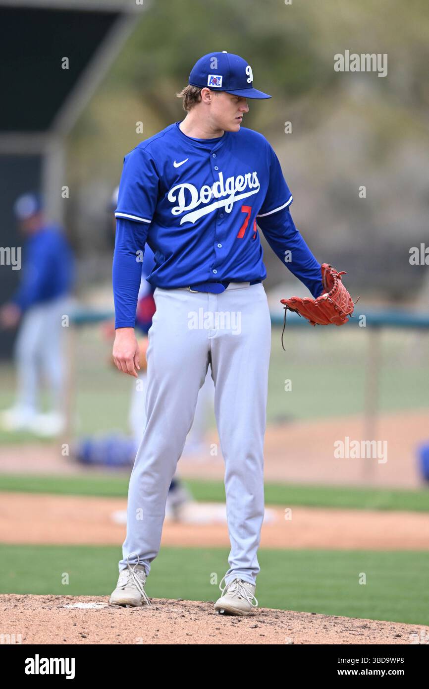 Los Angeles Dodgers pitcher Callum Wallace (74) looks in for the sign ...