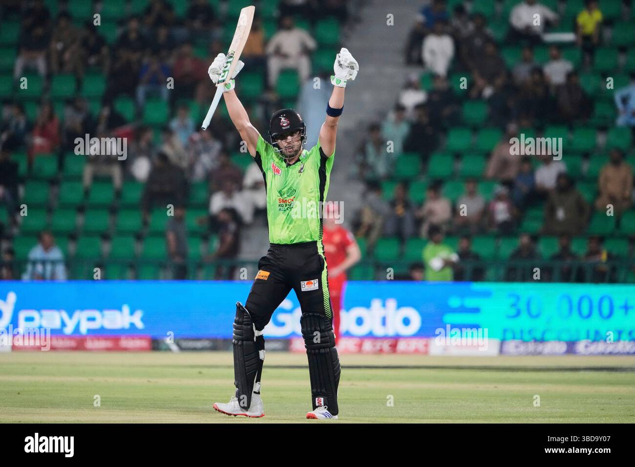 Lahore Qalandars' Mohammad Naeem celebrates after scoring fifty during ...