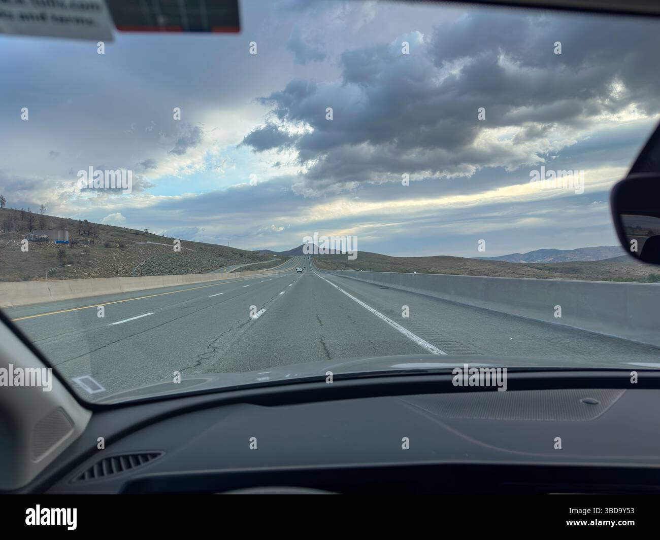 13 MAY 2025 - Nevada, USA - Driving the freeway on a road trip across ...