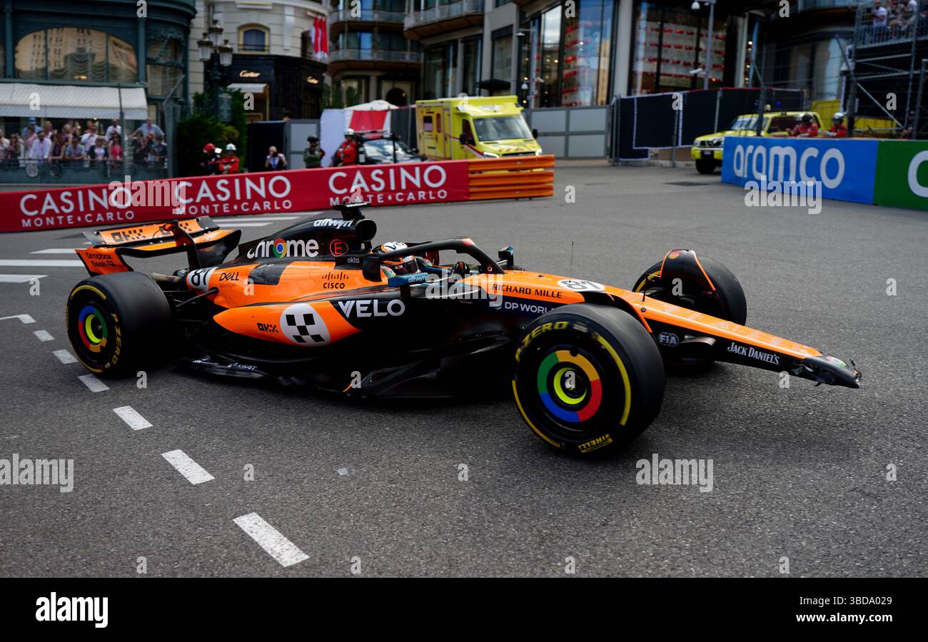 McLaren's Oscar Piastri heading back to the pits after hitting a ...