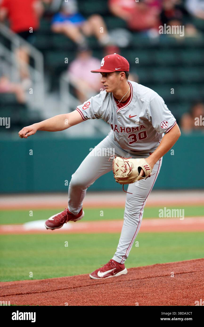Oklahoma Sooners pitcher Michael Catalano (30) delivers a pitch during ...