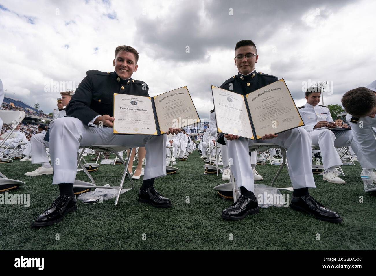 Annapolis, United States. 23rd May, 2025. Midshipman look at their ...