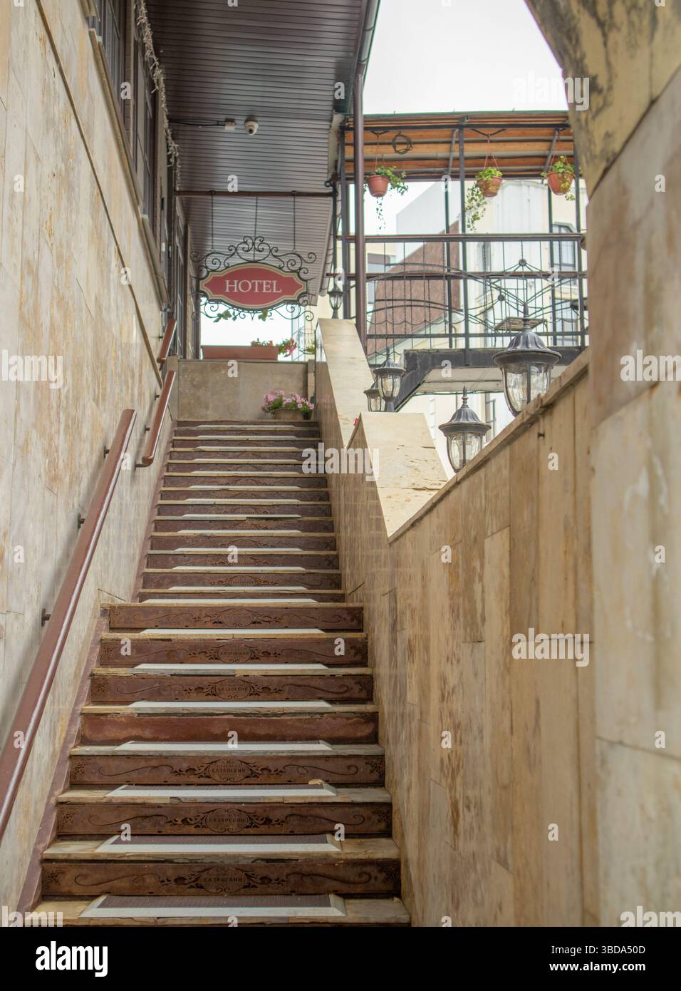 The stairs going up to where the hotel entrance is on the outside of ...