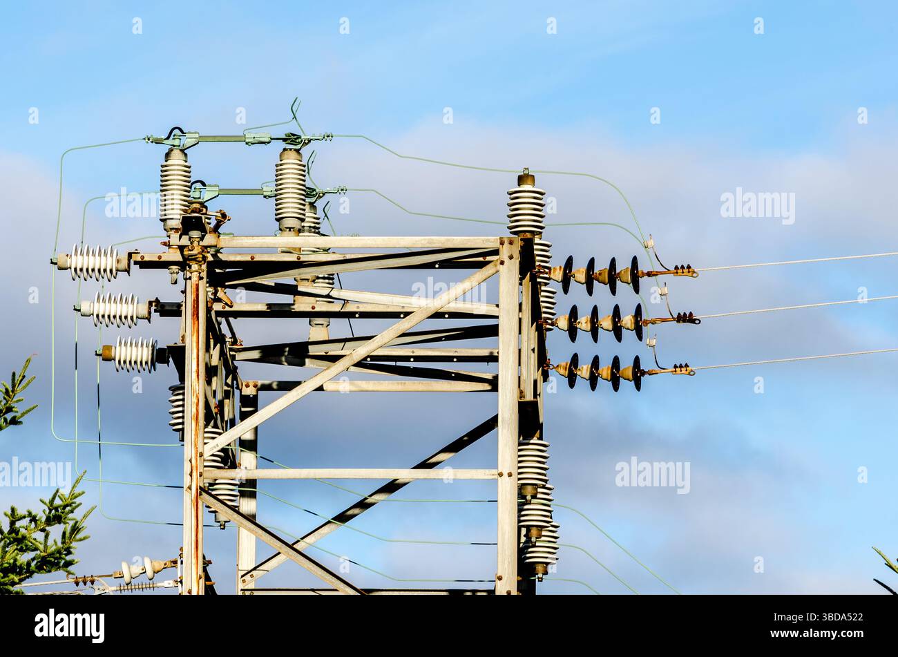 Powerline structures against the sky, showing wires and isolators Stock ...