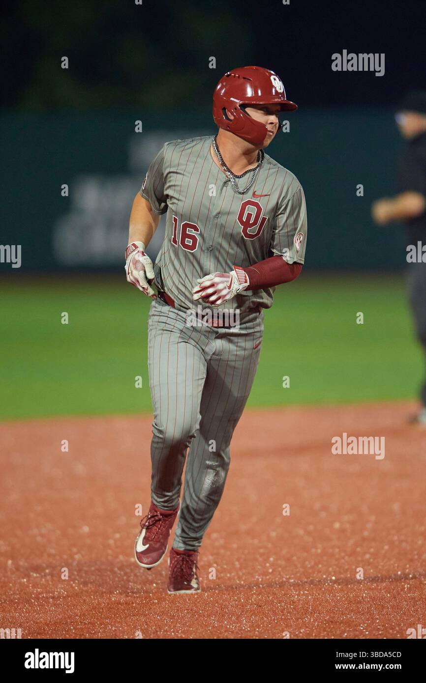Dayton Tockey (16) of the Oklahoma Sooners rounds second base following ...