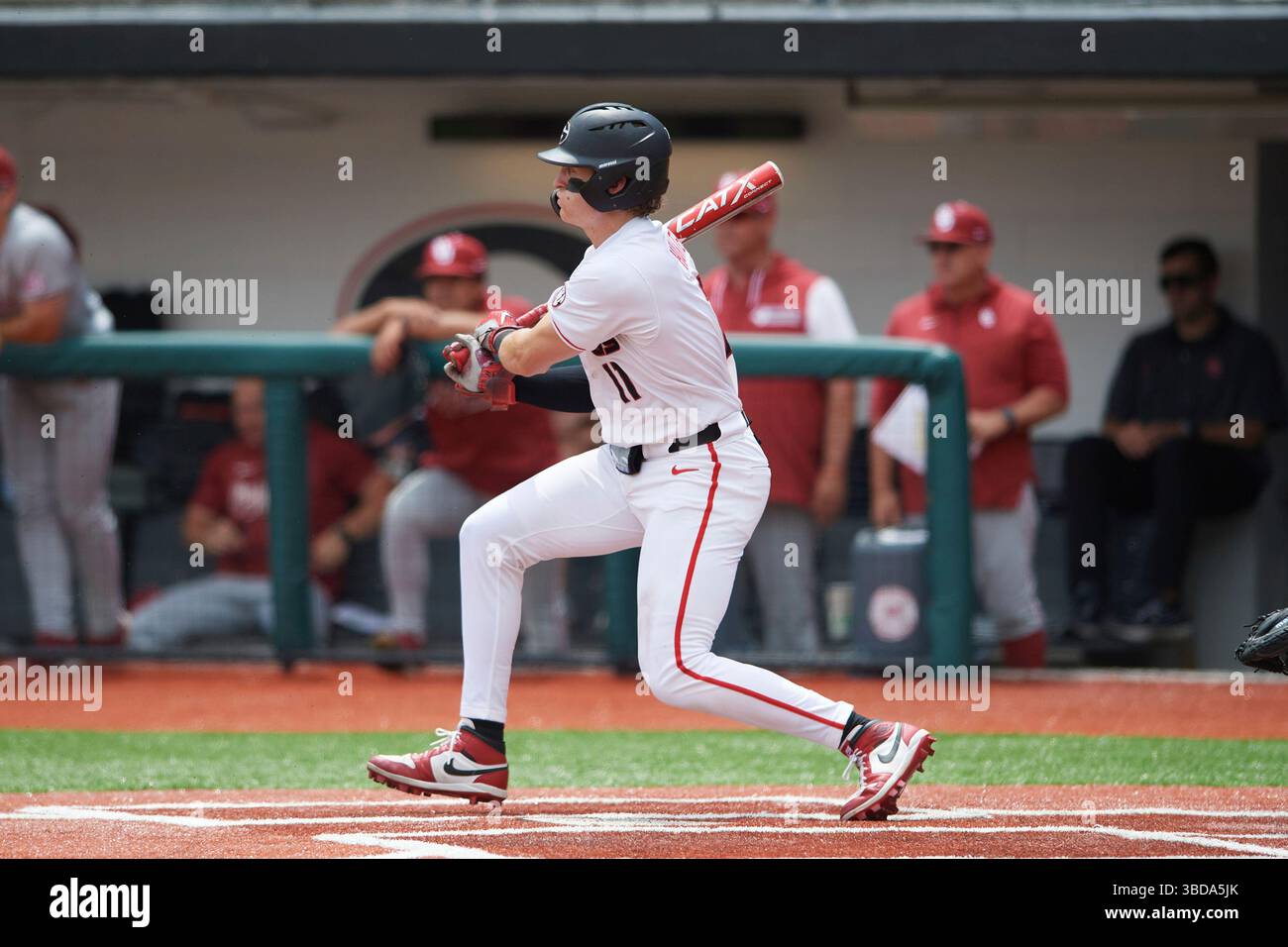 Henry Hunter (11) of the Georgia Bulldogs follows through on a swing ...