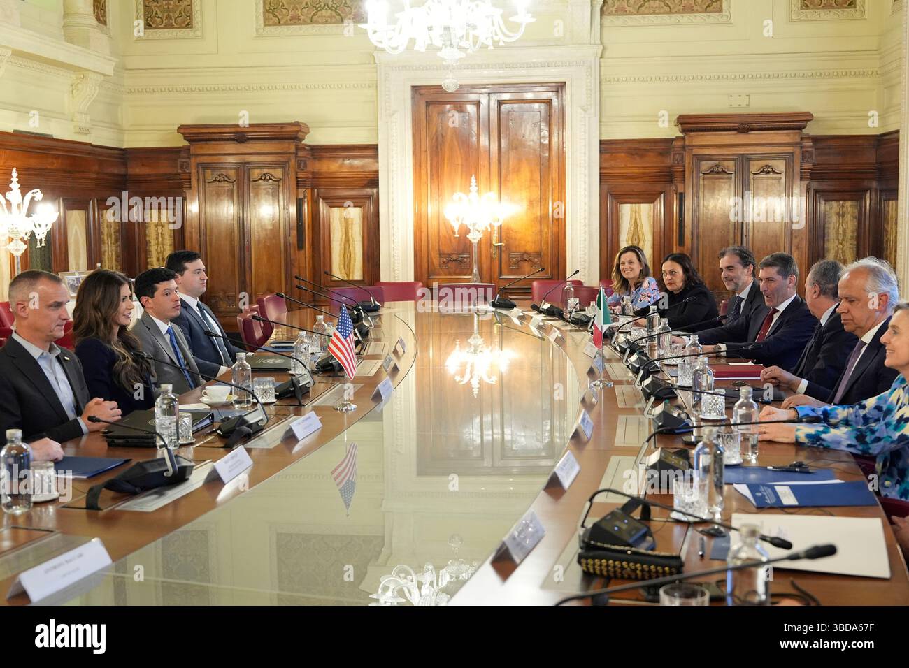 U.S. Homeland Security Secretary Kristi Noem, second from left, and ...