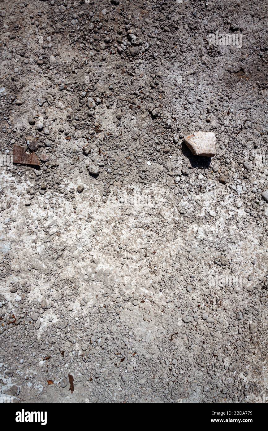 Concrete and cement stains on ground. Abstract messy construction ...