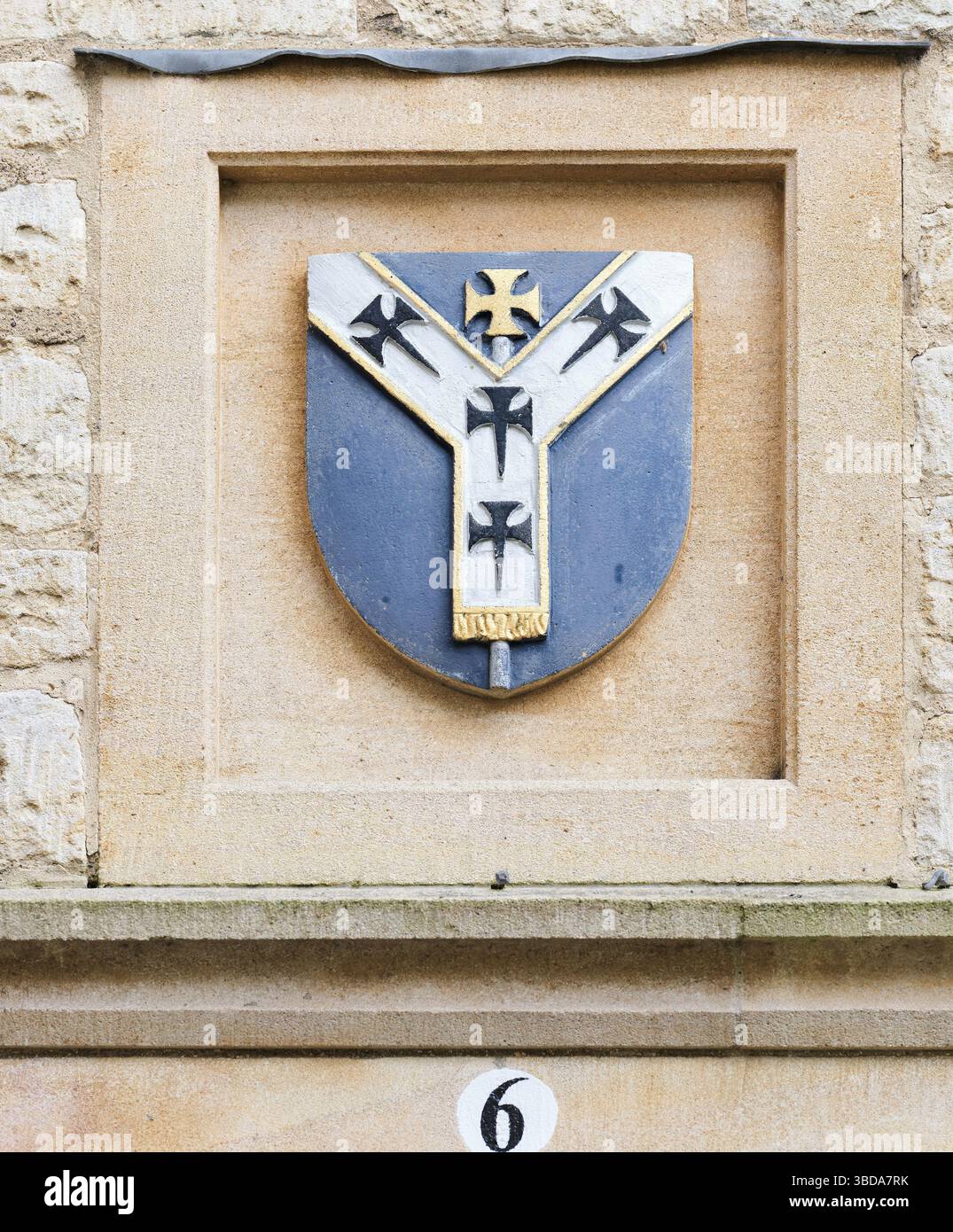 College emblem on a wall in St Edmund (Teddy) Hall College, University ...