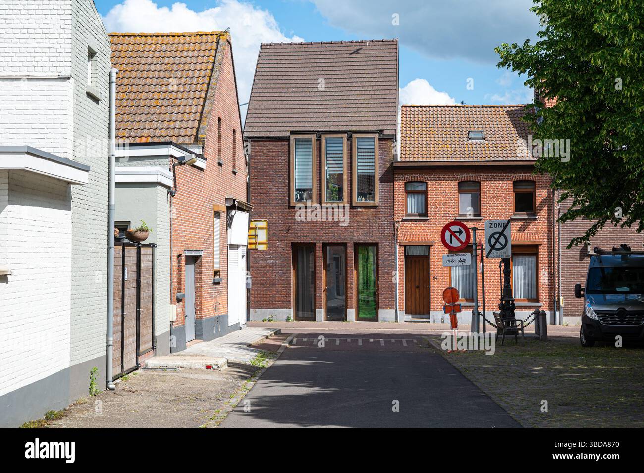 Traditional brick stone houses in a row in the village center of ...