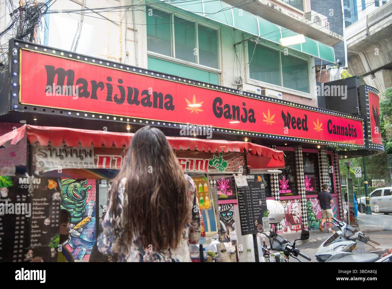 Nescafe and Marijuana Shops at a alley in Nana at Sukhumvit Road in the City of Bangkok in ...