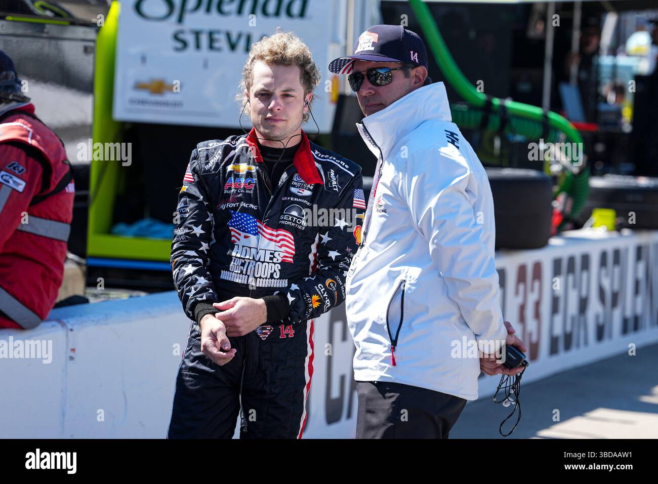 Santino Ferrucci talks with a member of his crew before the start ...