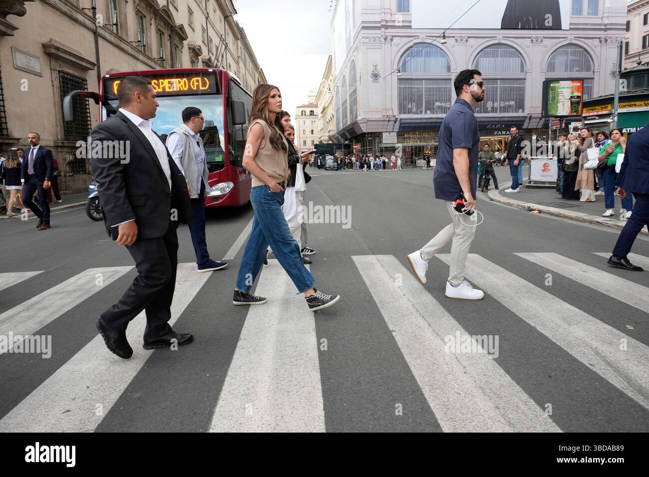U.S. Homeland Security Secretary Kristi Noem walks in downtown Rome ...