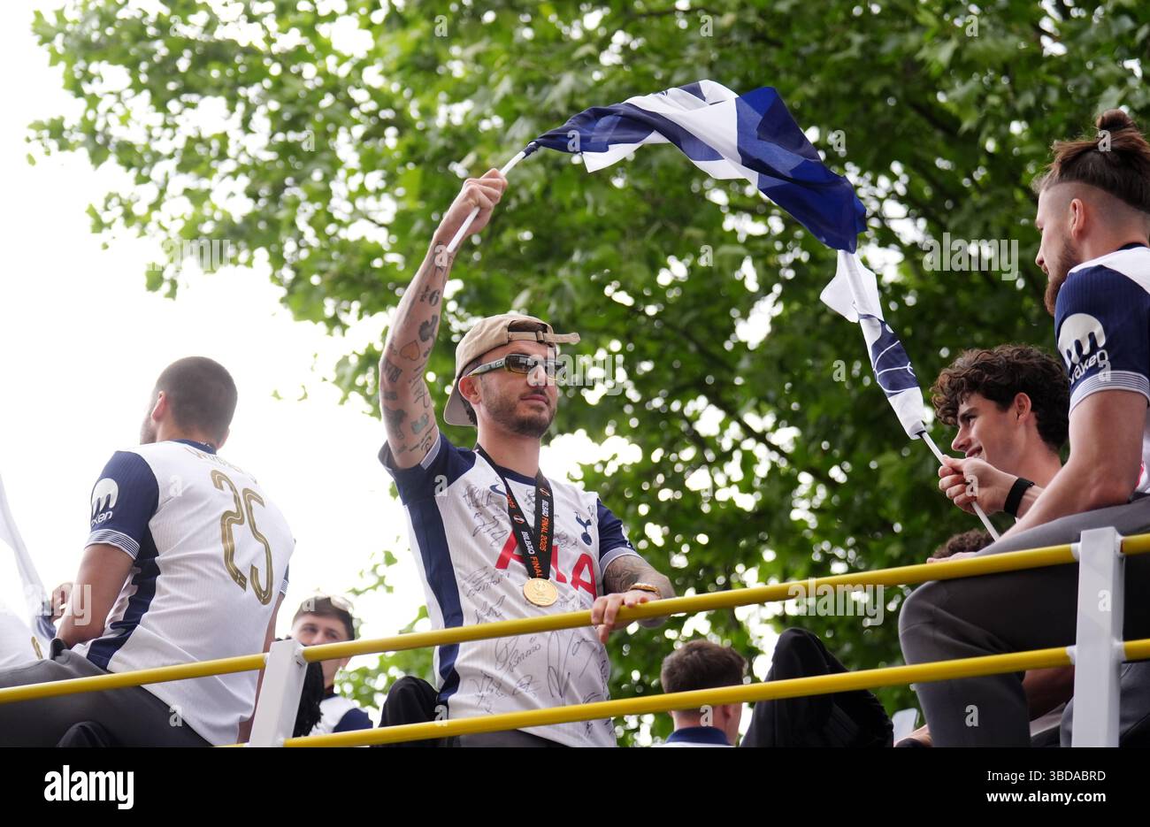 Tottenham Hotspur's James Maddison on the open-top team bus during the ...