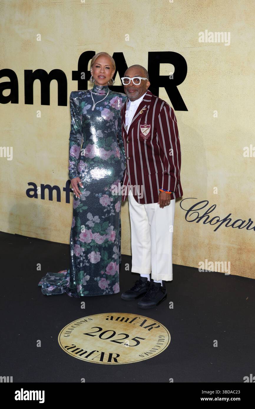 Spike Lee, Tonya Lewis Lee attend the amfAR Gala Cannes 2025 presented ...