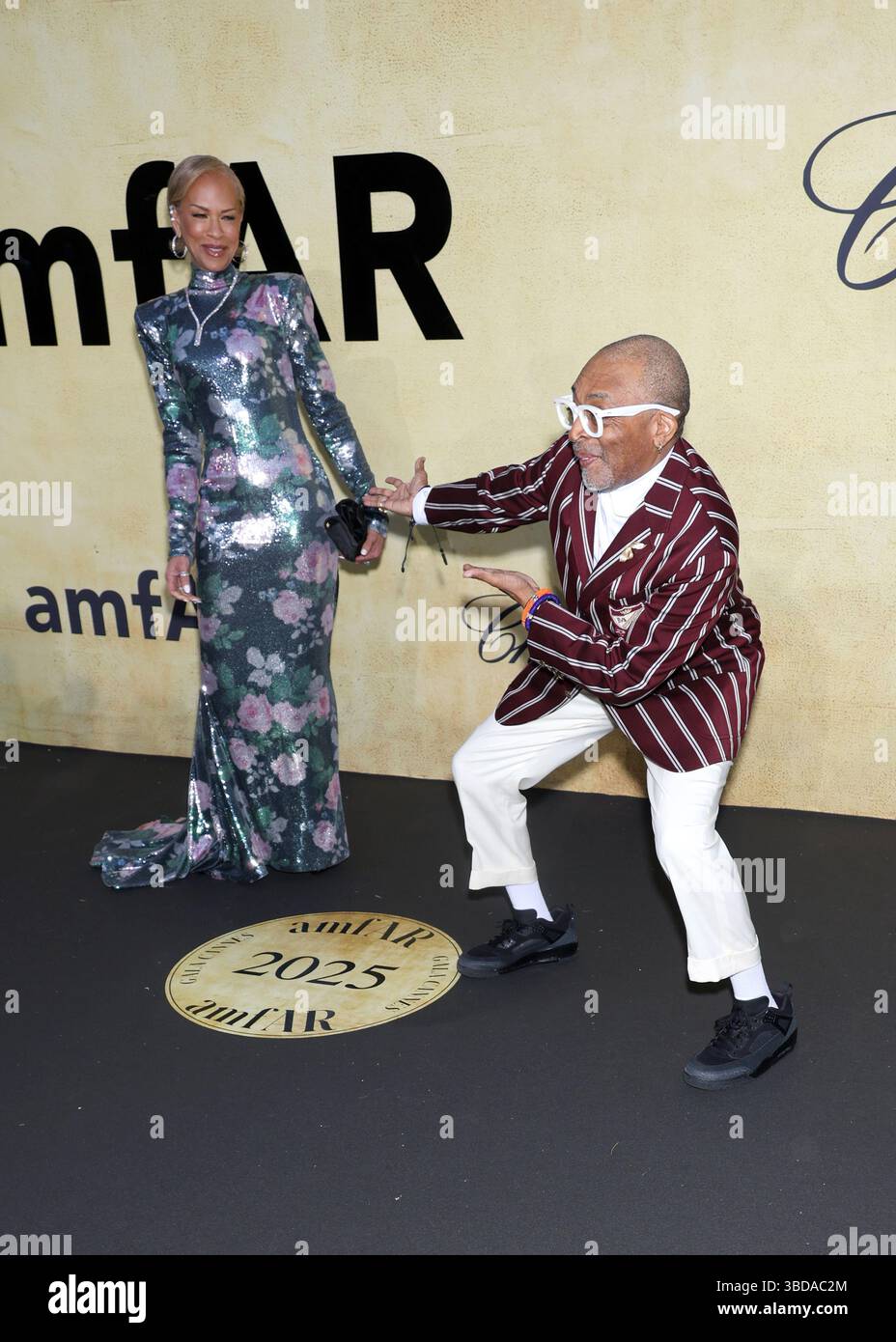 Spike Lee, Tonya Lewis Lee attend the amfAR Gala Cannes 2025 presented ...
