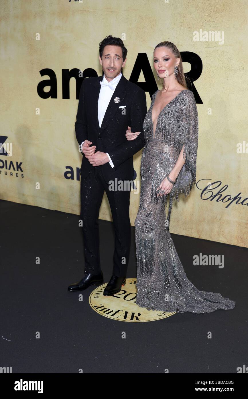 Adrien Brody and Georgina Chapman attend the amfAR Gala Cannes 2025 ...