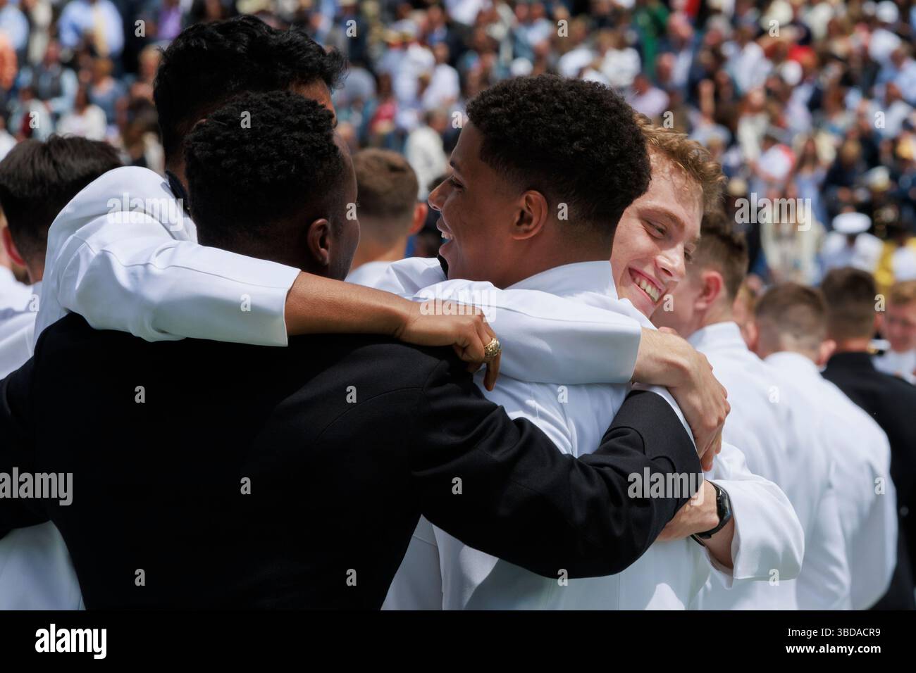 U.S. Naval Academy graduates celebrate at the end of the academy's ...