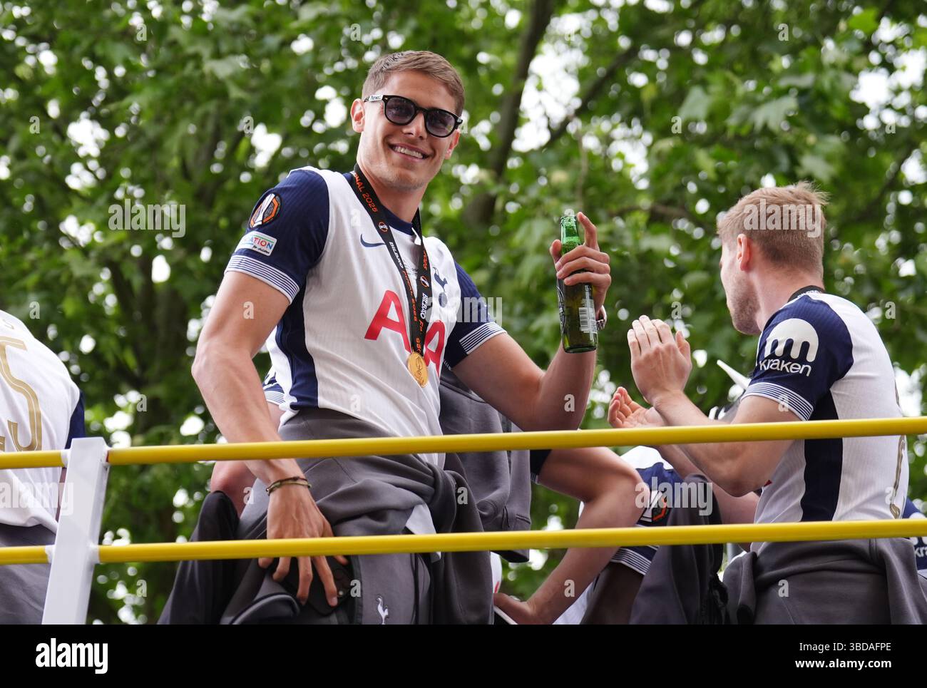 Tottenham Hotspur's Micky van de Ven on the open-top team bus during ...