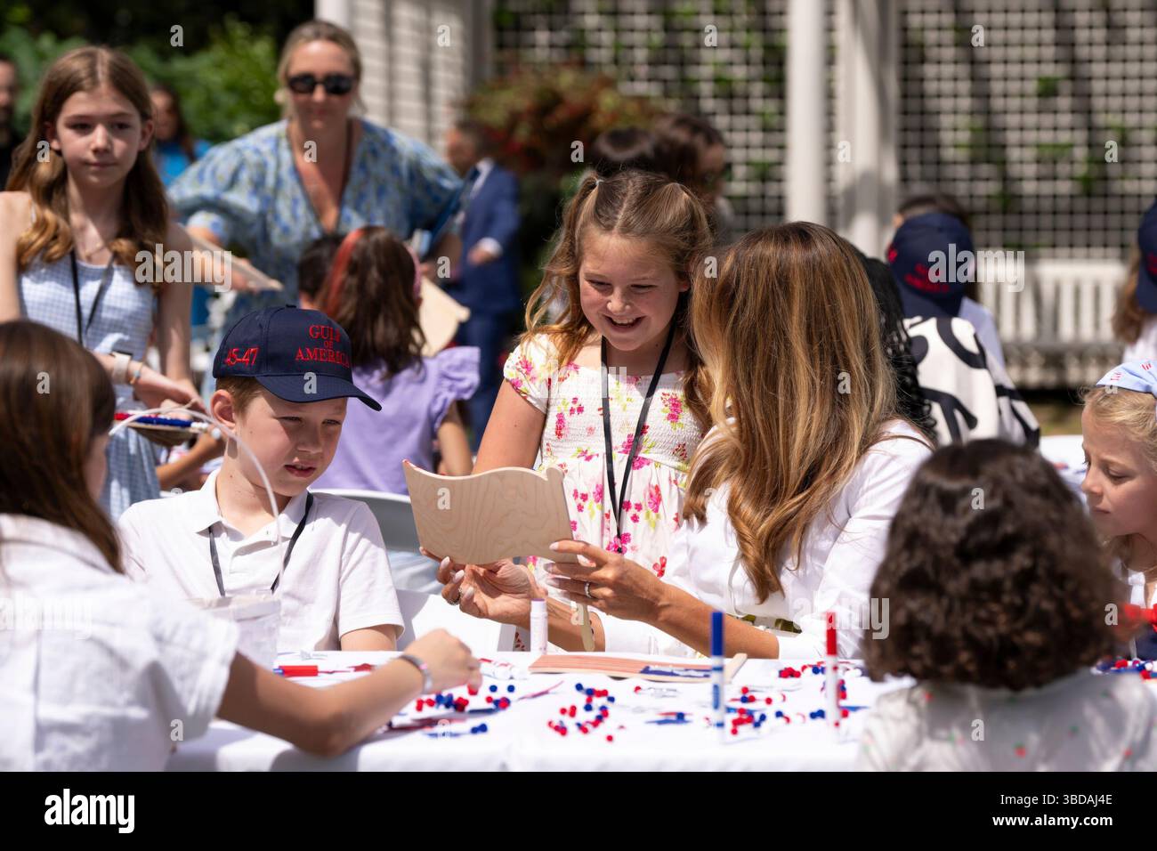 First Lady Melania Trump greets parents and children participating in ...