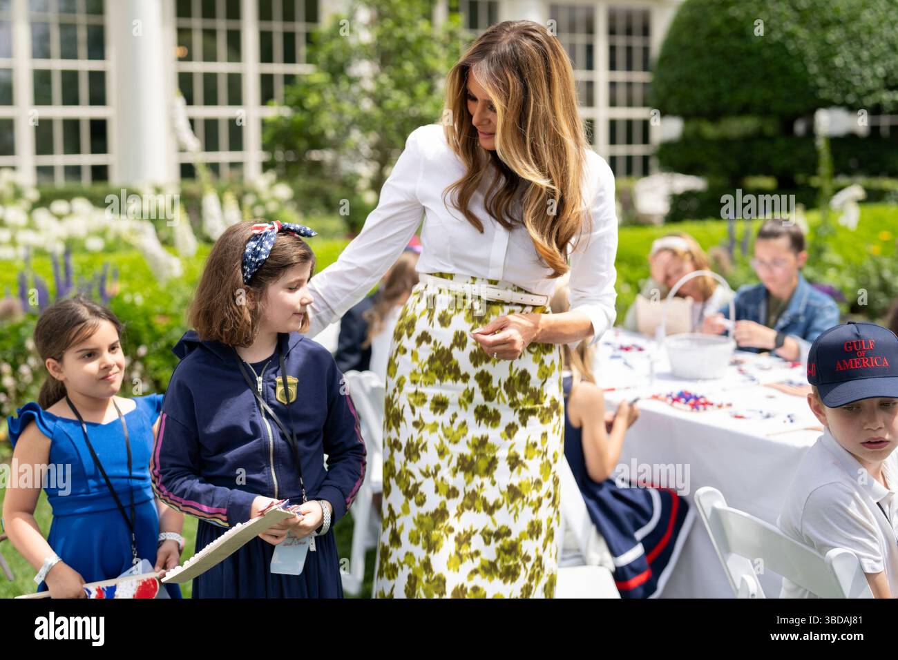 First Lady Melania Trump greets parents and children participating in ...
