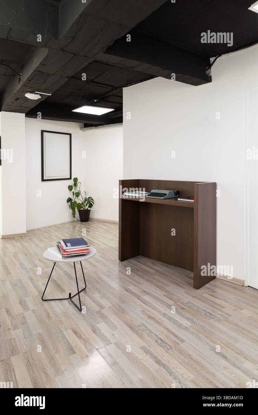 A contemporary waiting area featuring comfortable seating and a stylish ...