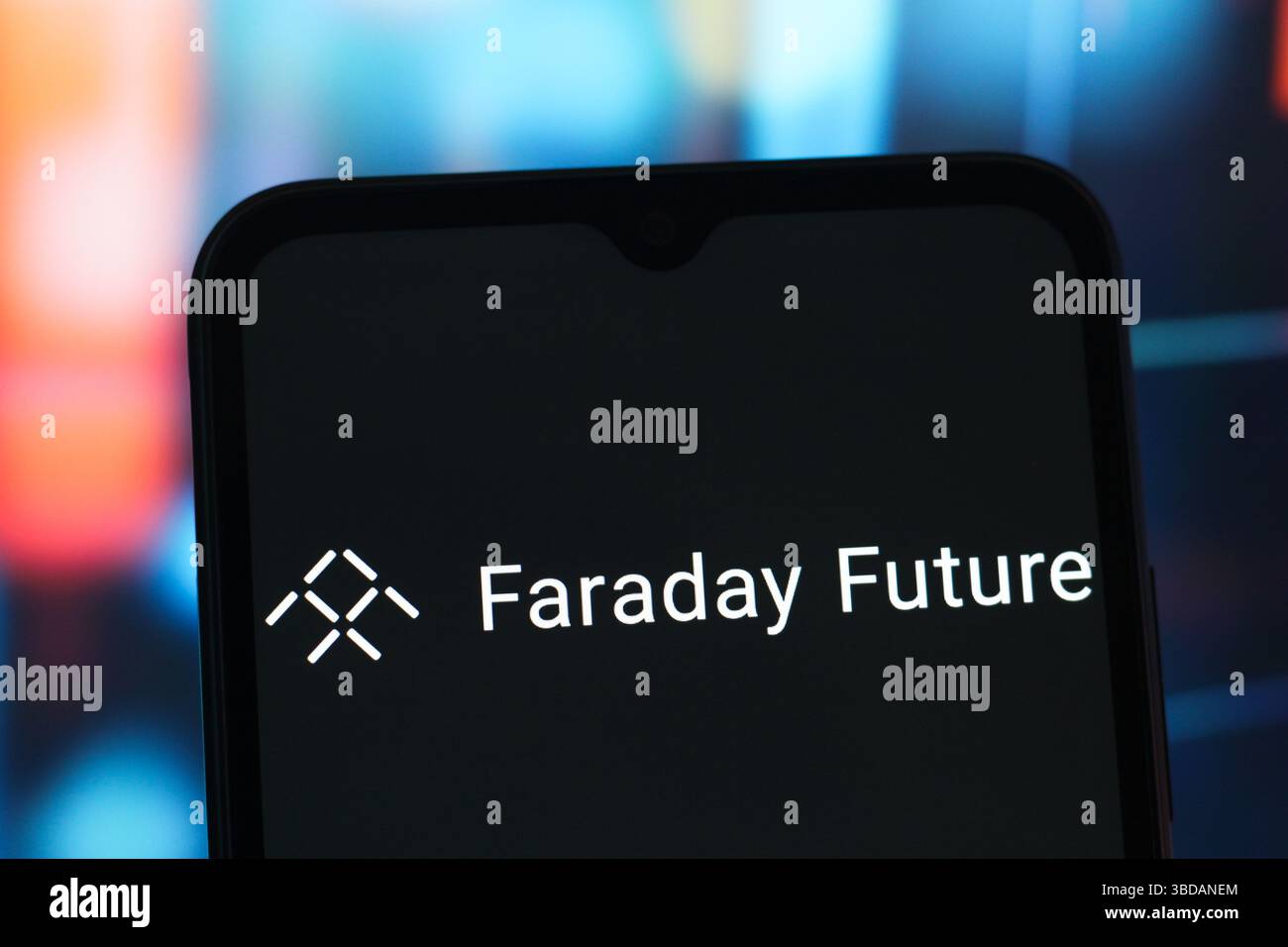 In this photo illustration, the Faraday Future logo is seen displayed on a smartphone screen ...