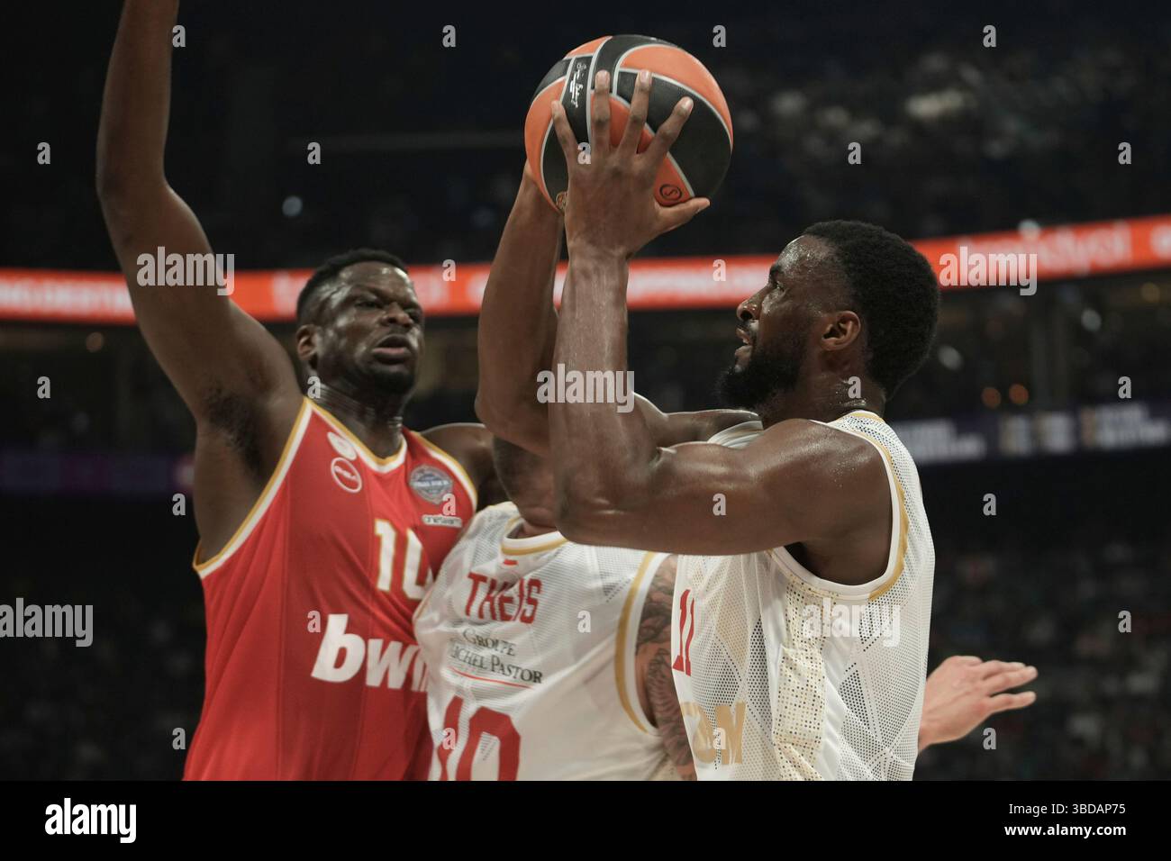 Monaco's Alpha Diallo shoots by Olympiacos' Moustapha Fall duirng the ...