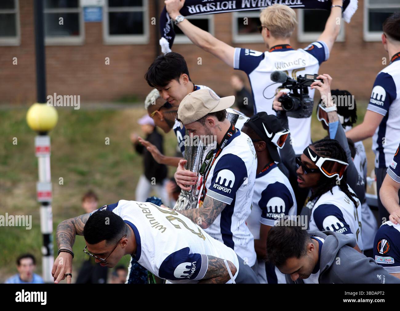 Tottenham Hotspur's James Maddison on the open-top team bus during the ...