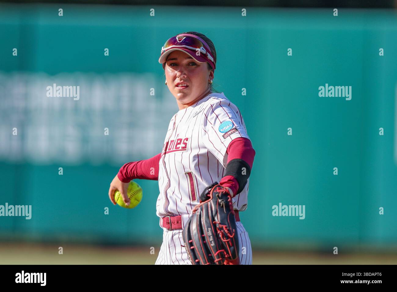 Florida State outfielder Hallie Wacaser (1) warms up before an NCAA ...