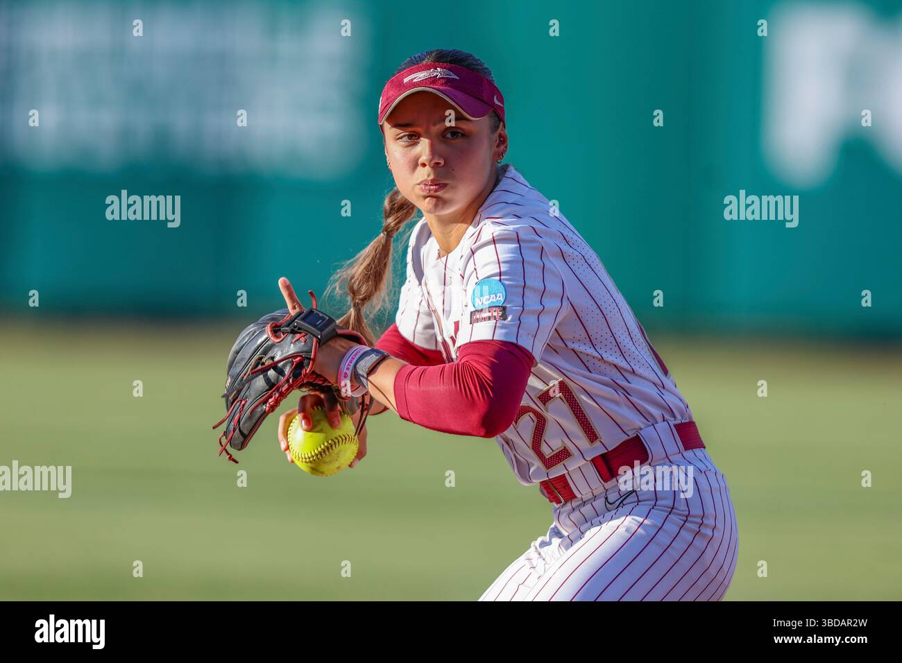 Florida State infielder Krystina Hartley (27) warms up before an NCAA ...