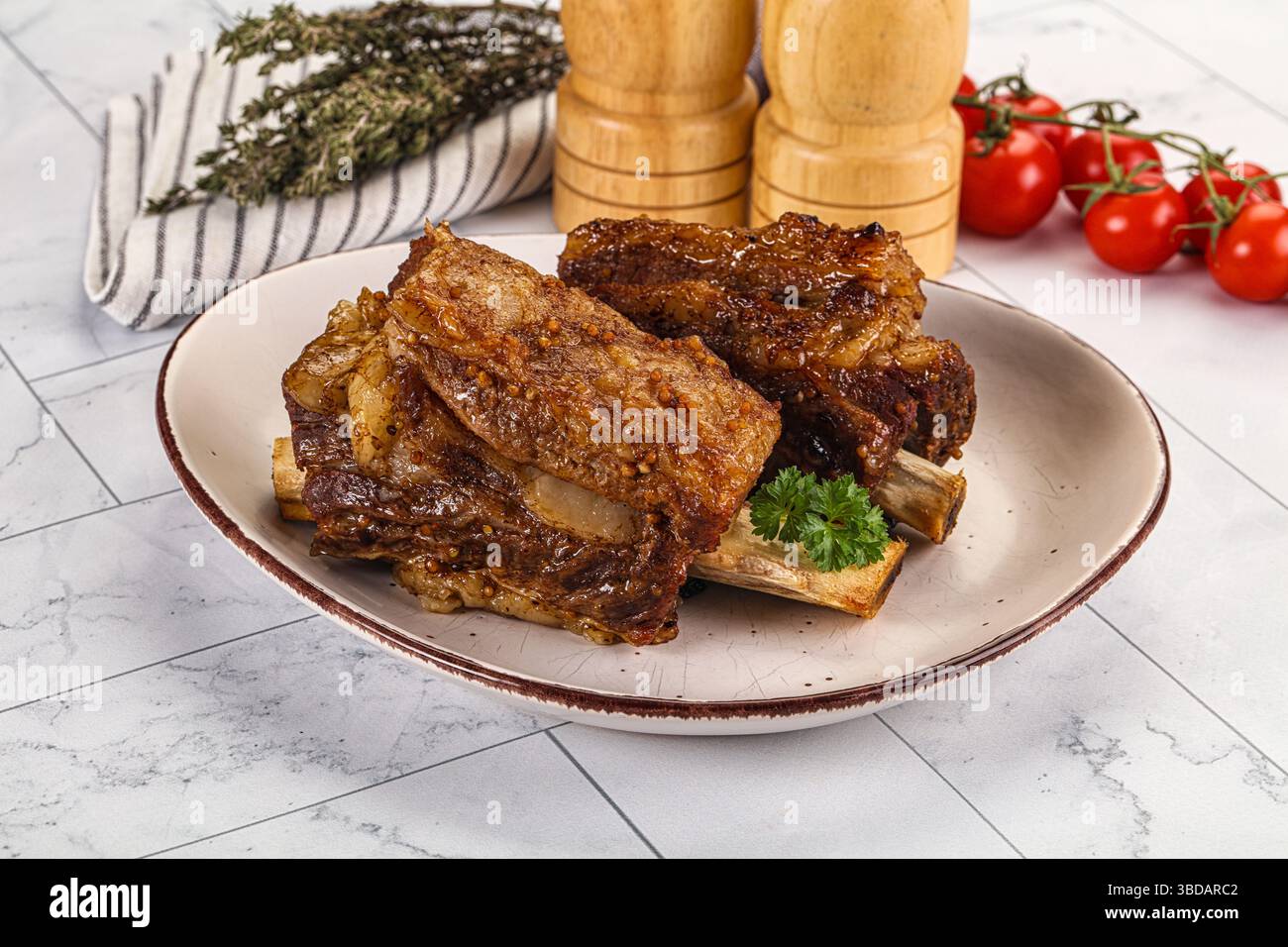 Baked beef ribs with marinade with seasoning Stock Photo - Alamy