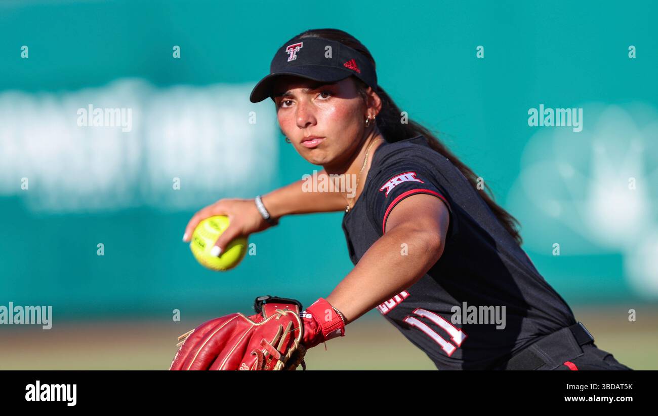 Texas Tech infielder Lauren Allred (11) warms up before an NCAA super ...