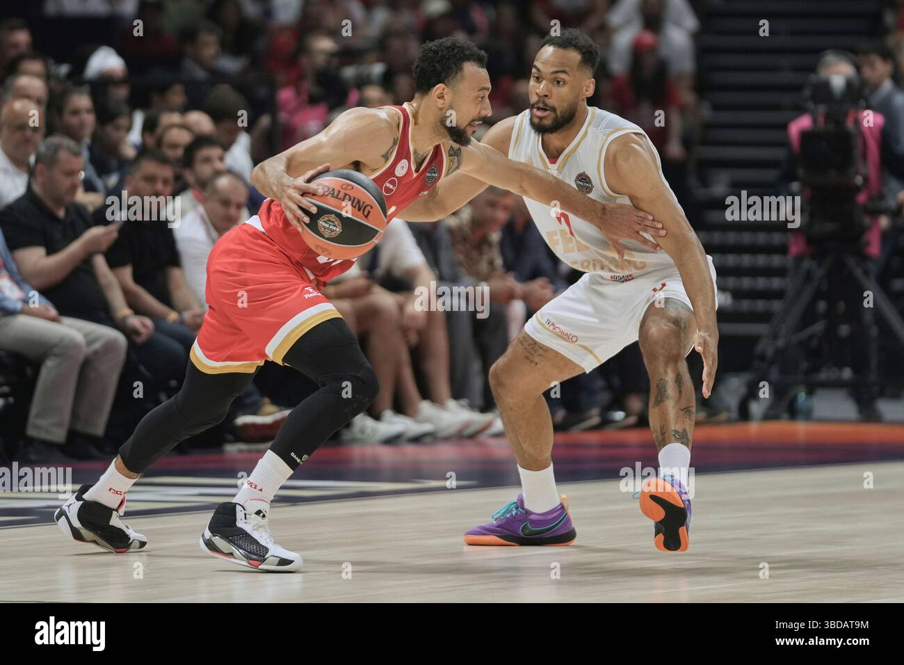 Monaco's Elie Okobo guards Olympiacos' Nigel Williams-Goss duirng the ...