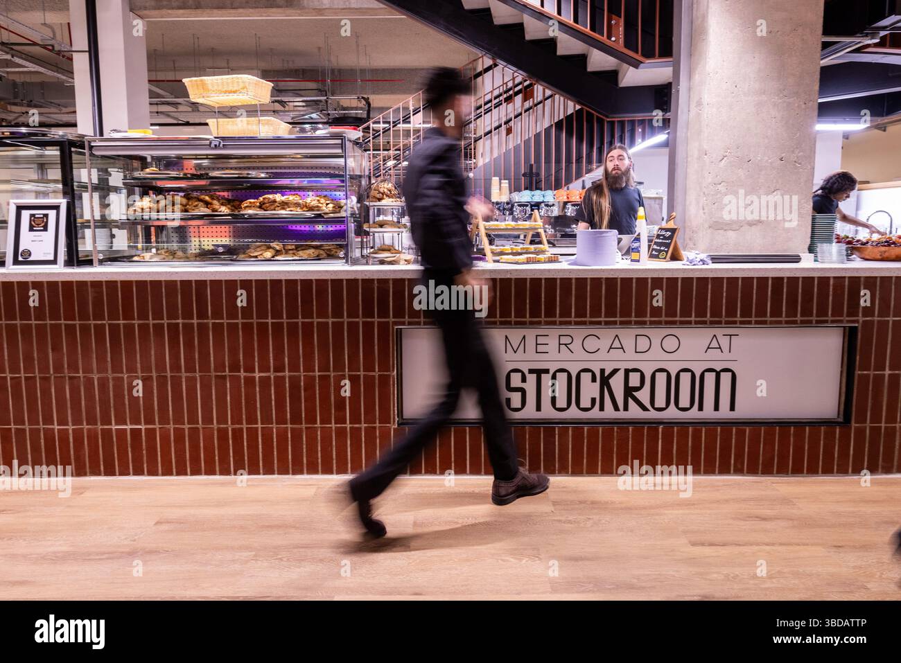 EDITORIAL USE ONLY Visitors tour the facilities at Stockroom, a new £14 ...