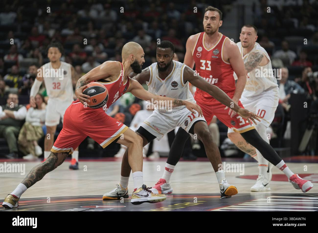 Monaco's Alpha Diallo guards Olympiacos' Evan Fournier duirng the Euroleague seimifinal ...