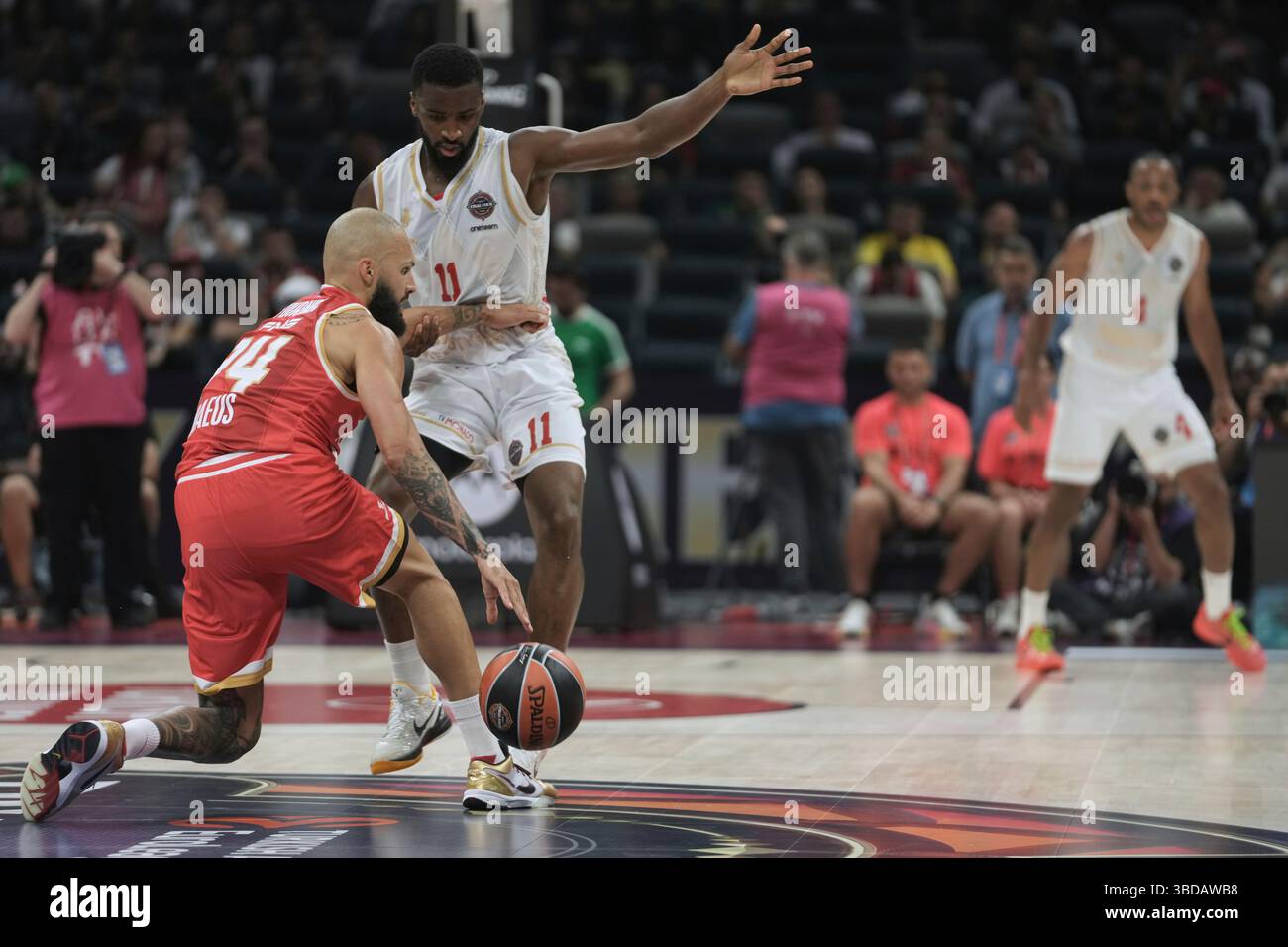 Monaco's Alpha Diallo guards Olympiacos' Evan Fournier duirng the Euroleague seimifinal ...