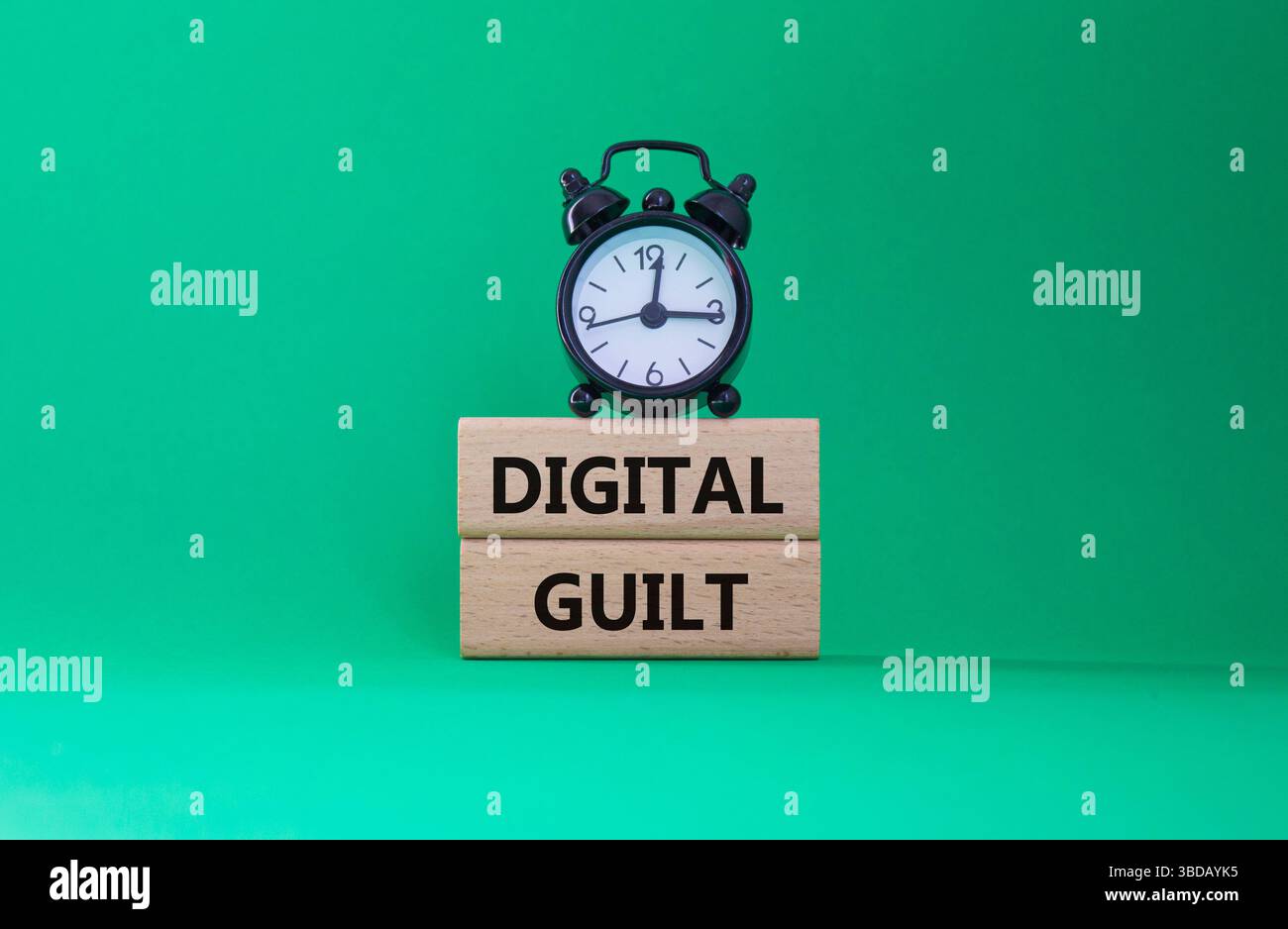 Digital Guilt symbol. Concept words Digital Guilt on wooden blocks ...