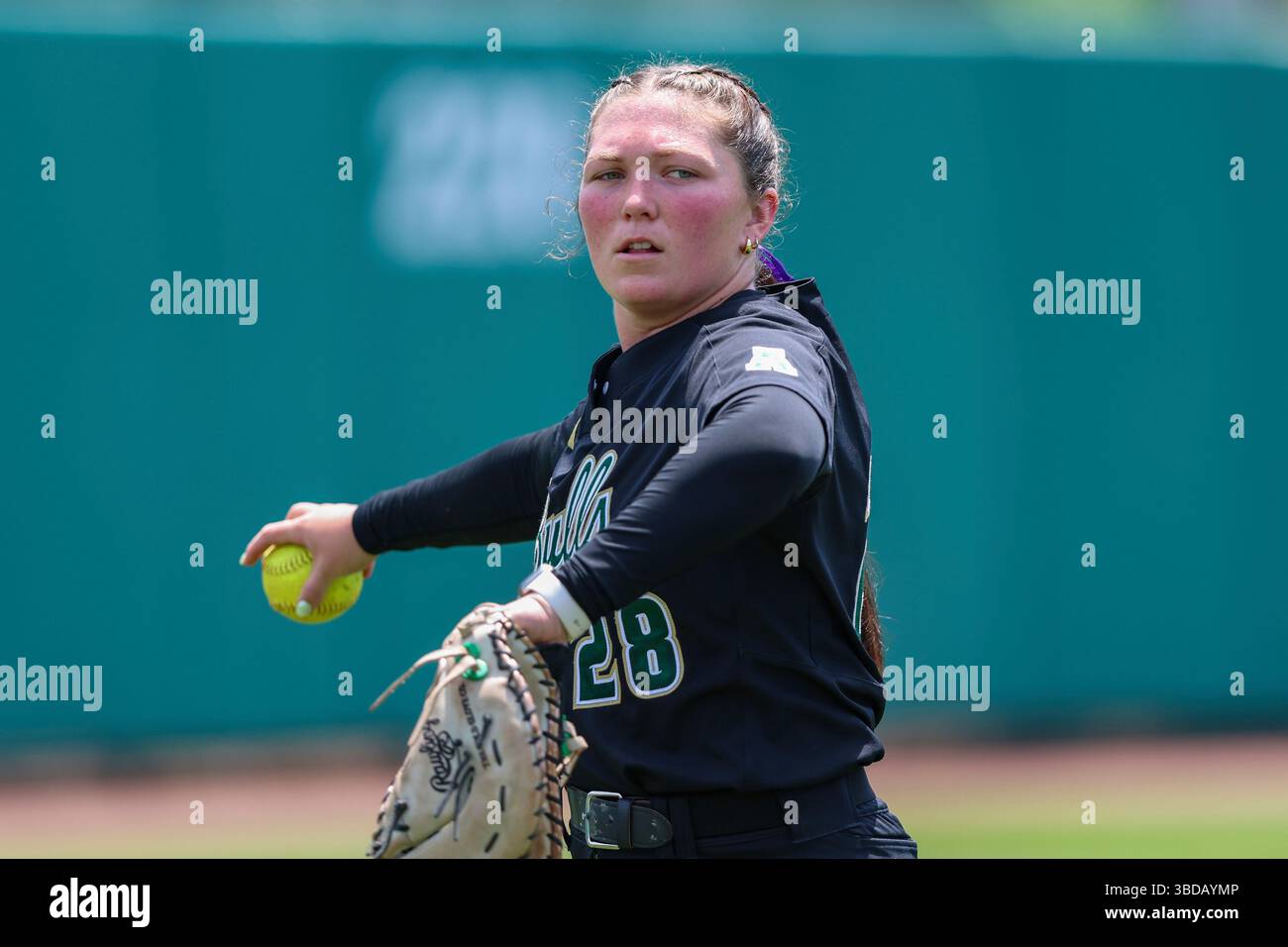 South Florida catcher Josie Foreman (28) warms up before an NCAA ...