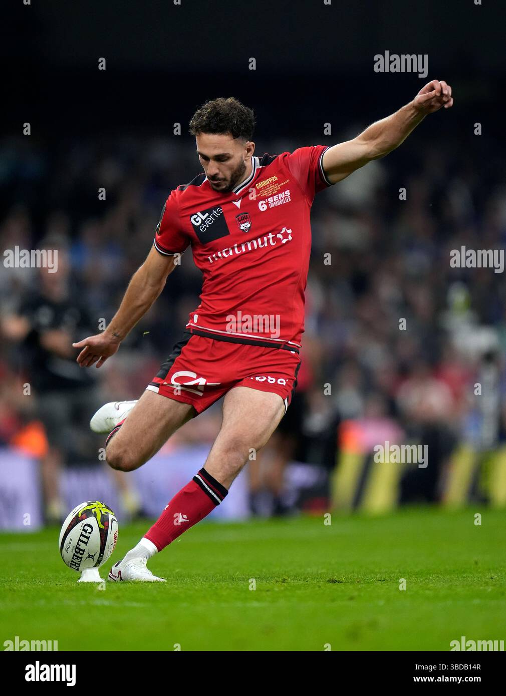 Lyon's Leo Berdeu kicks a conversion during the EPCR Challenge Cup ...